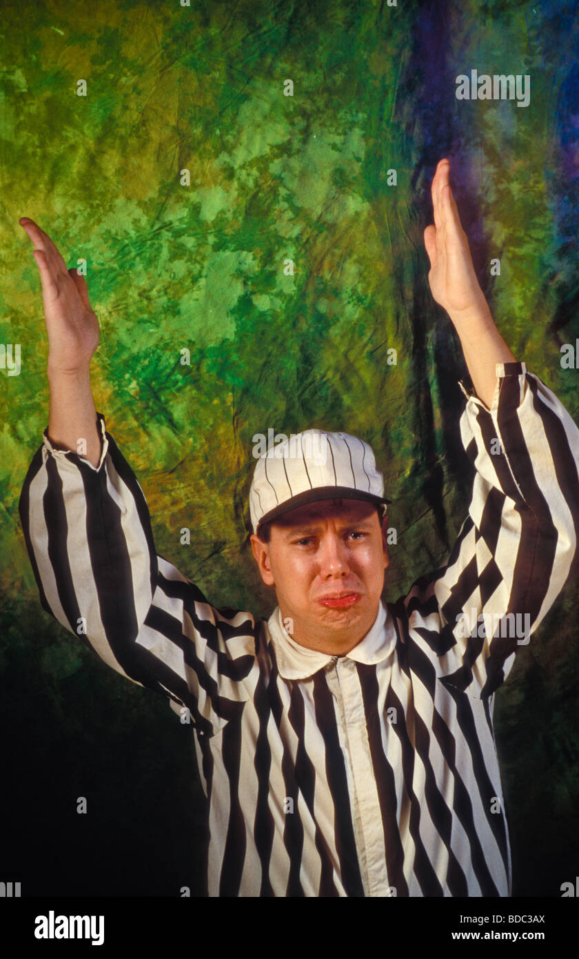 Young sport umpire referee signals scoring touchdown. excitement yell ...