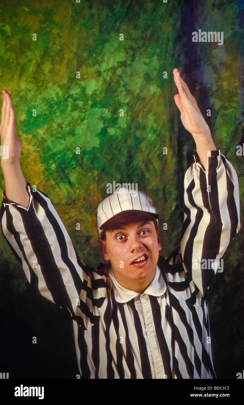 Young sport umpire referee signals scoring touchdown. excitement yell ...