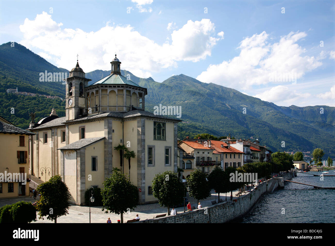 A small lakeside church in Italy Stock Photo - Alamy