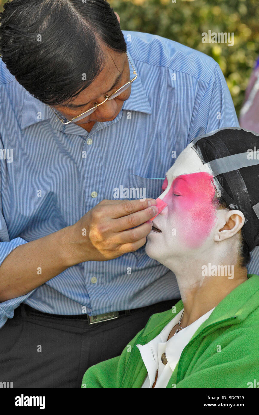 Vancouver Cantonese Opera performer having makeup applied at Dragon ...