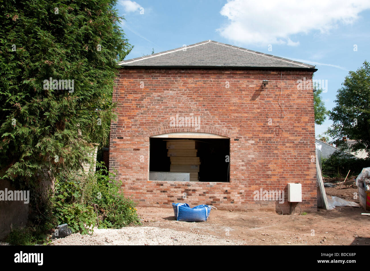 Newly built arched window opening to replace partly collapsed wall ...
