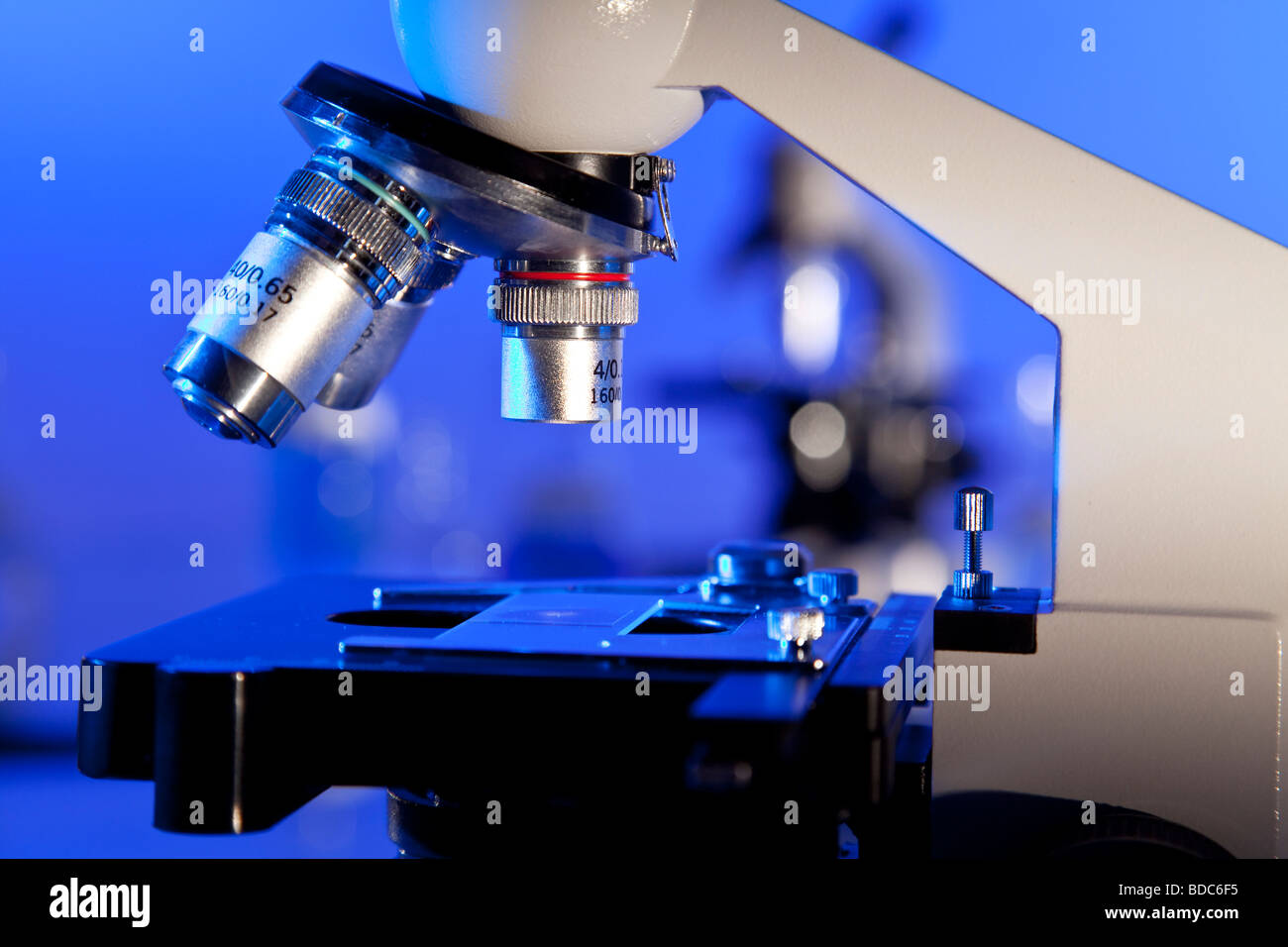 Microscope in a medical or scientific research laboratory with another ...