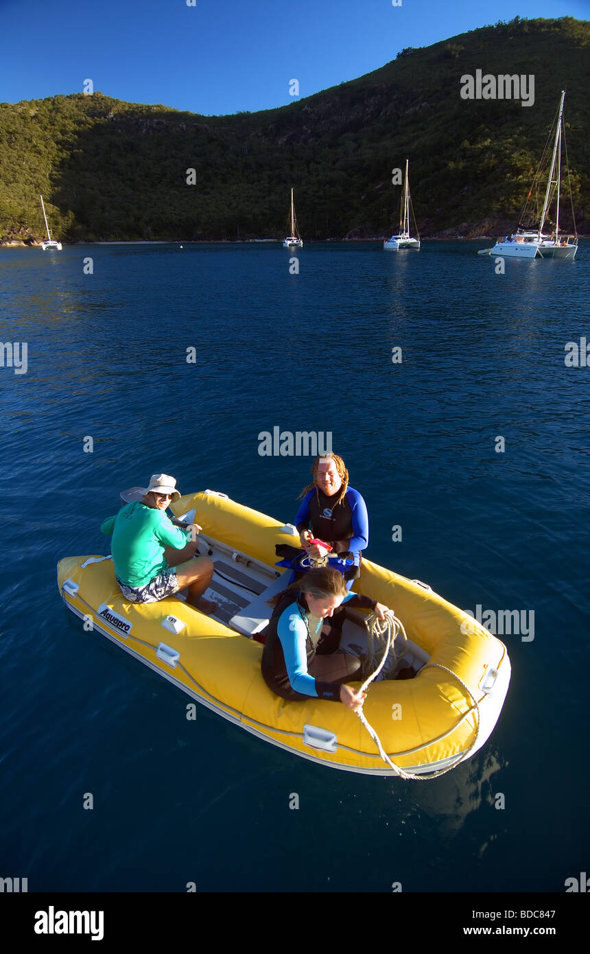 Snorkellers setting off in yellow inflatable boat Cateran Bay, Border ...