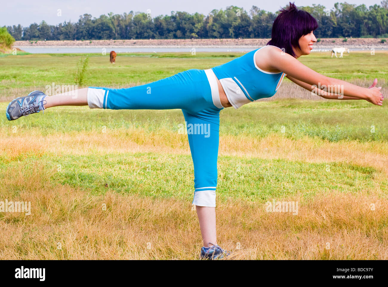 Active woman exercising outdoors Stock Photo - Alamy