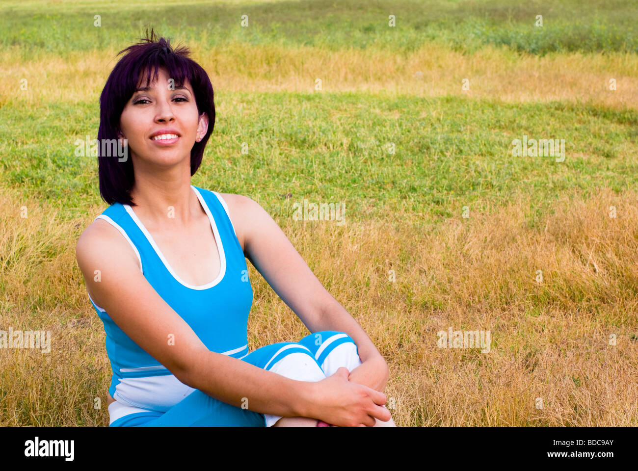 healthy woman rests outside in a park Stock Photo - Alamy