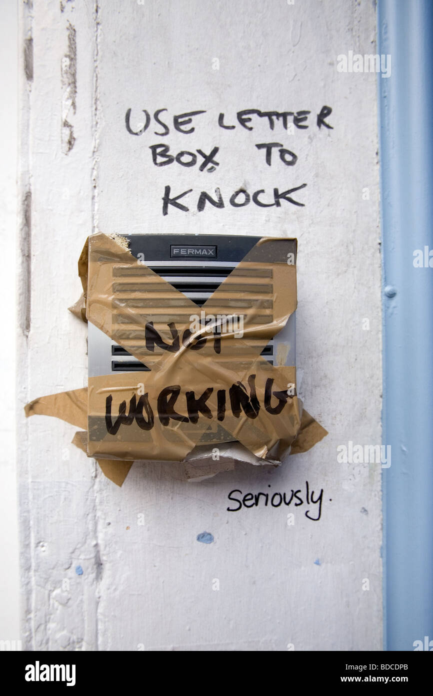 a door entry system with a funny message in london Stock Photo - Alamy