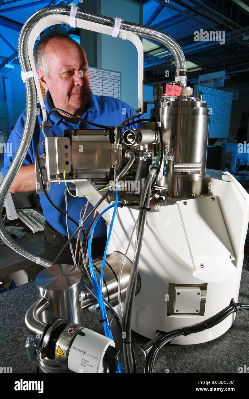 Electronics engineer working in a factory Stock Photo - Alamy