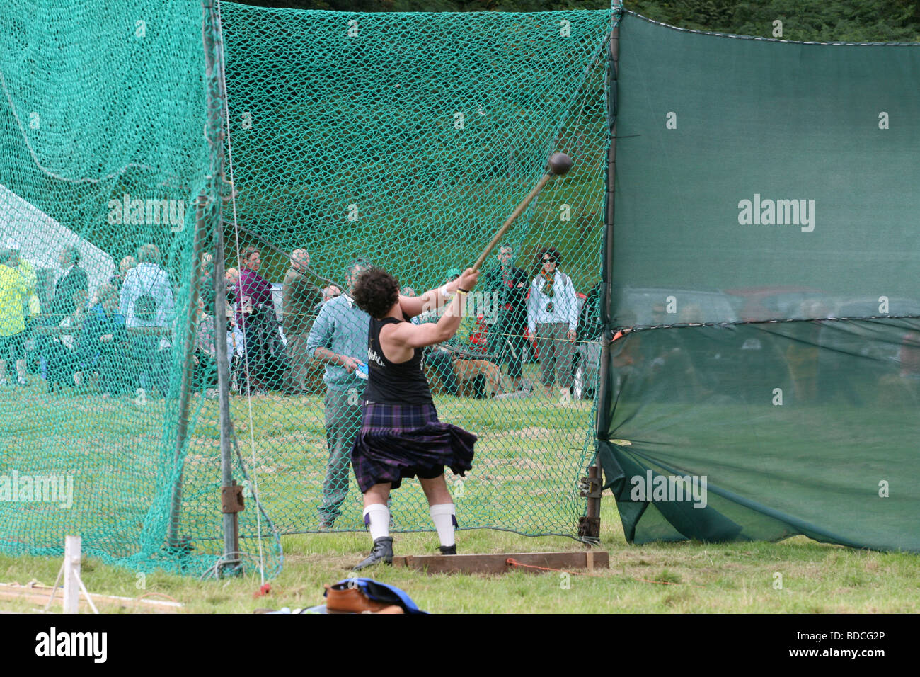 man competing at Scottish hammer throw at Cortachy 2009 highland games ...