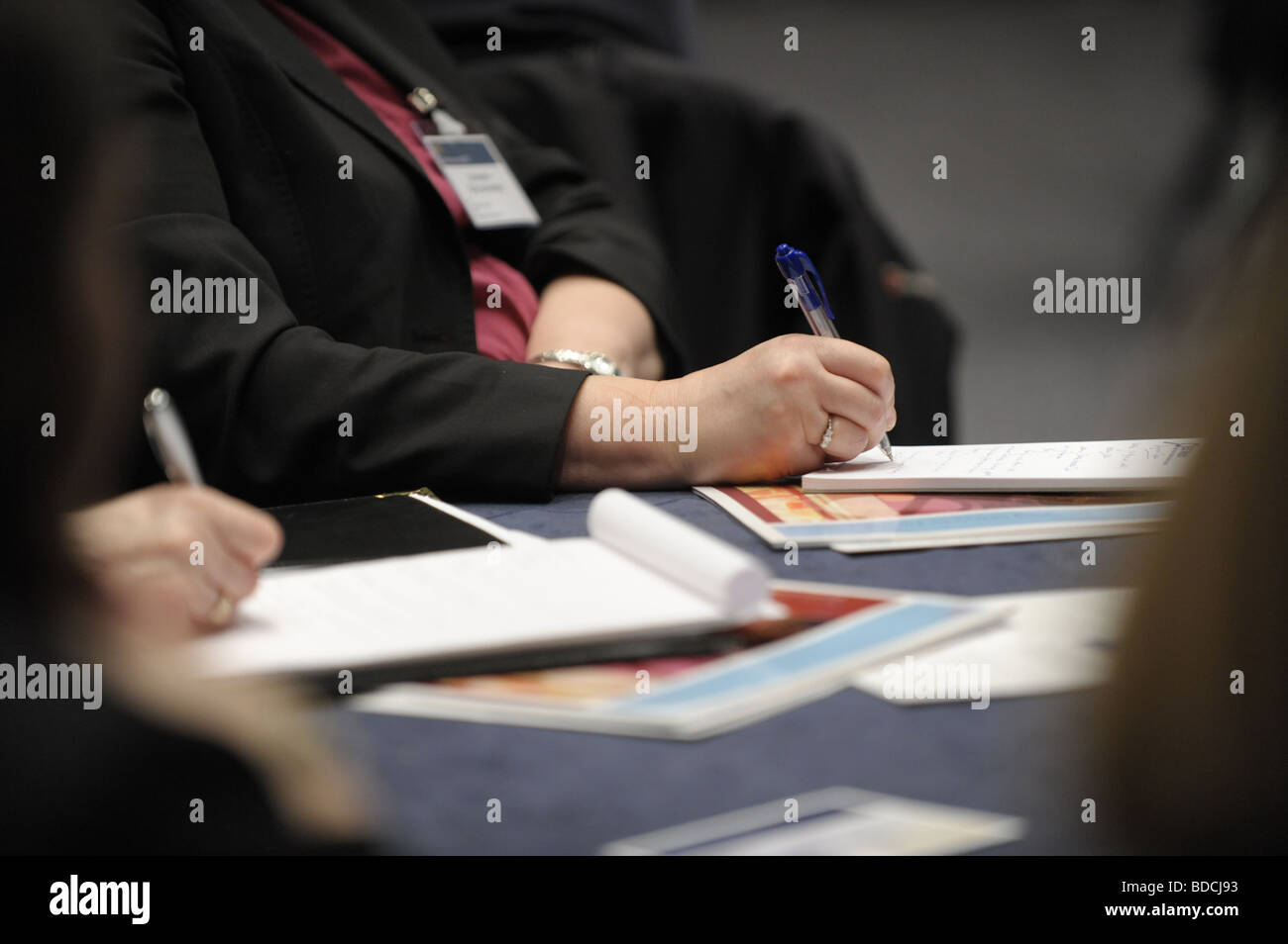 Notetaking hand pen and paper Stock Photo - Alamy