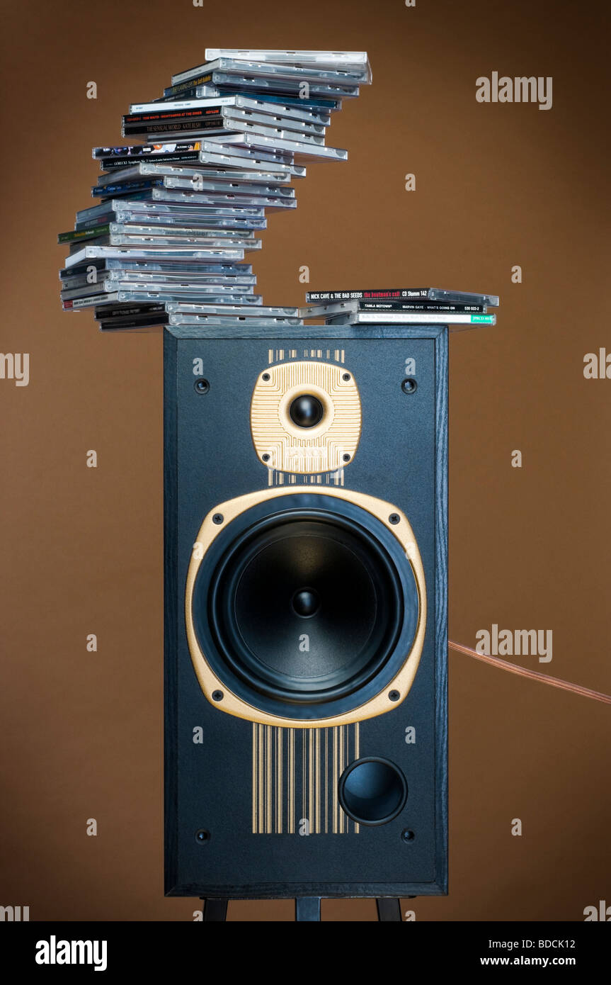 Stack of Cd s on loudspeaker Stock Photo - Alamy