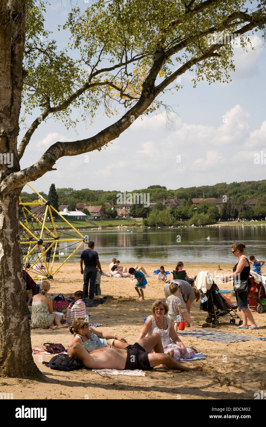 People on a sunny afternoon on the sand at Ruislip Lido, London UK ...