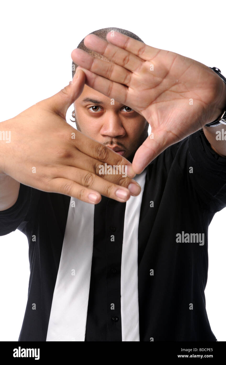 African American man using hands to frame face isolated over white ...