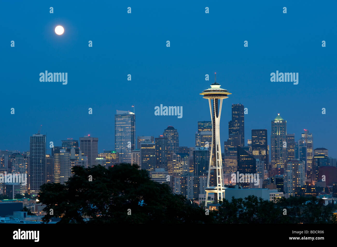 Retro image of Seattle skyline at sunset with full moon with Space ...