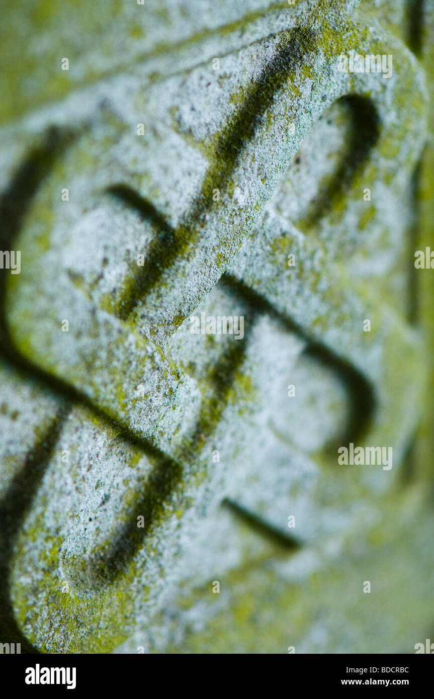 Celtic Symbol engraved on stone Stock Photo - Alamy