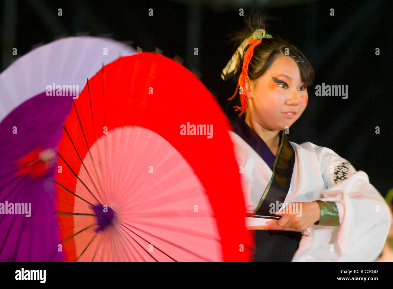 A female perfomer on stage at Odori Park during the Yosakoi Festival in ...