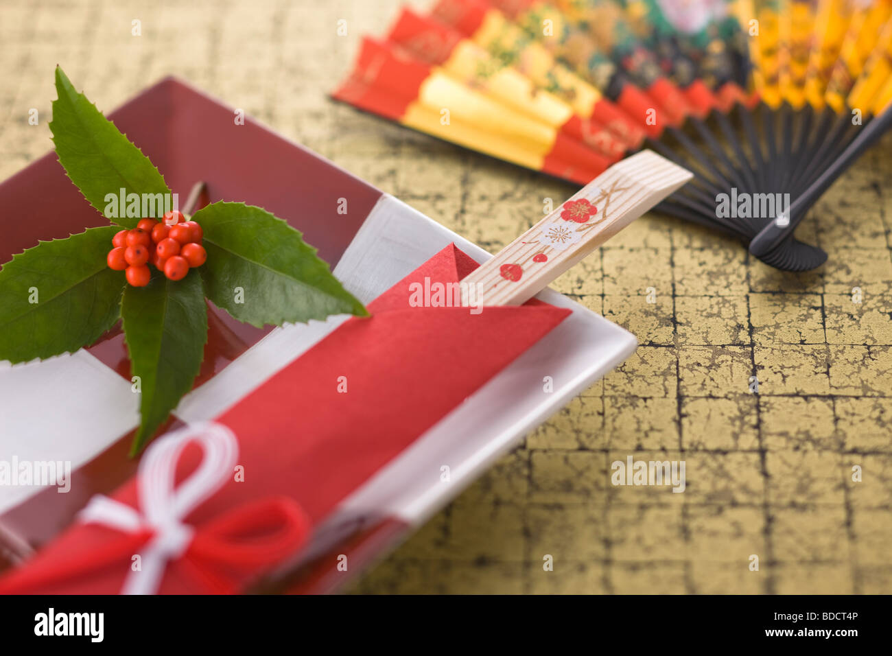Fan and chopsticks Stock Photo - Alamy