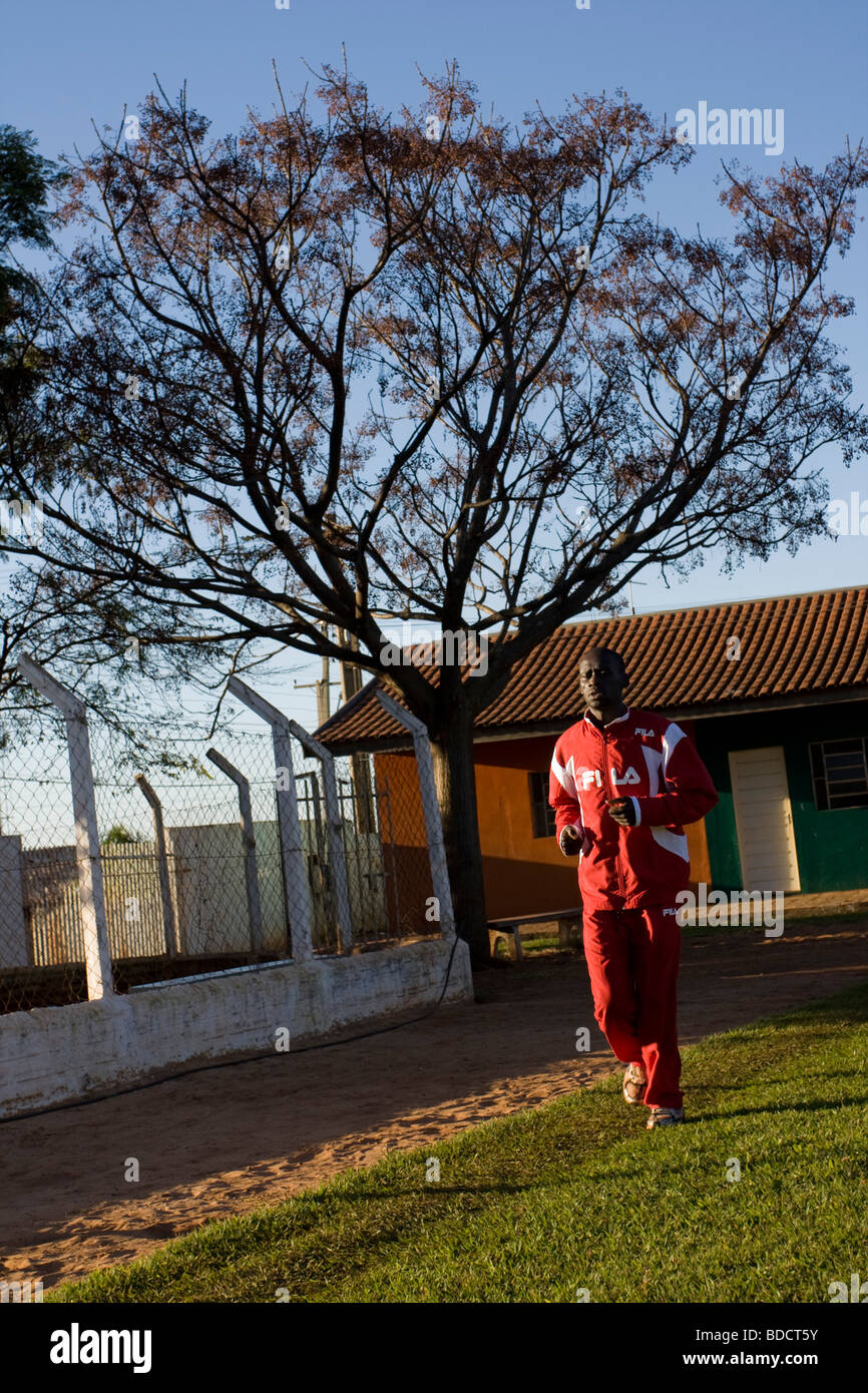 Professional runners from Africa training in Brazil for street races or ...