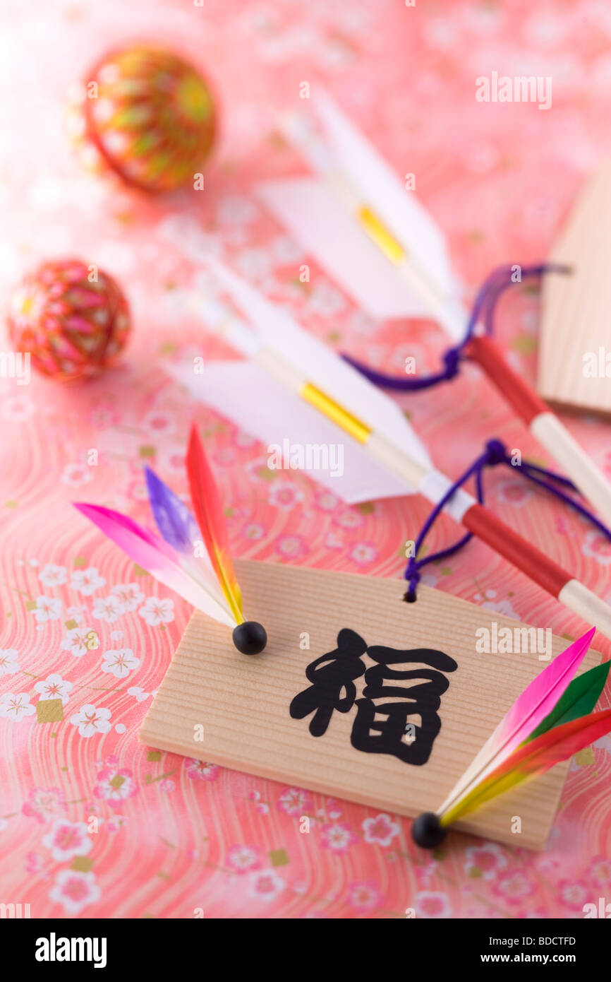 Prayer Blocks and decorative arrow Stock Photo - Alamy