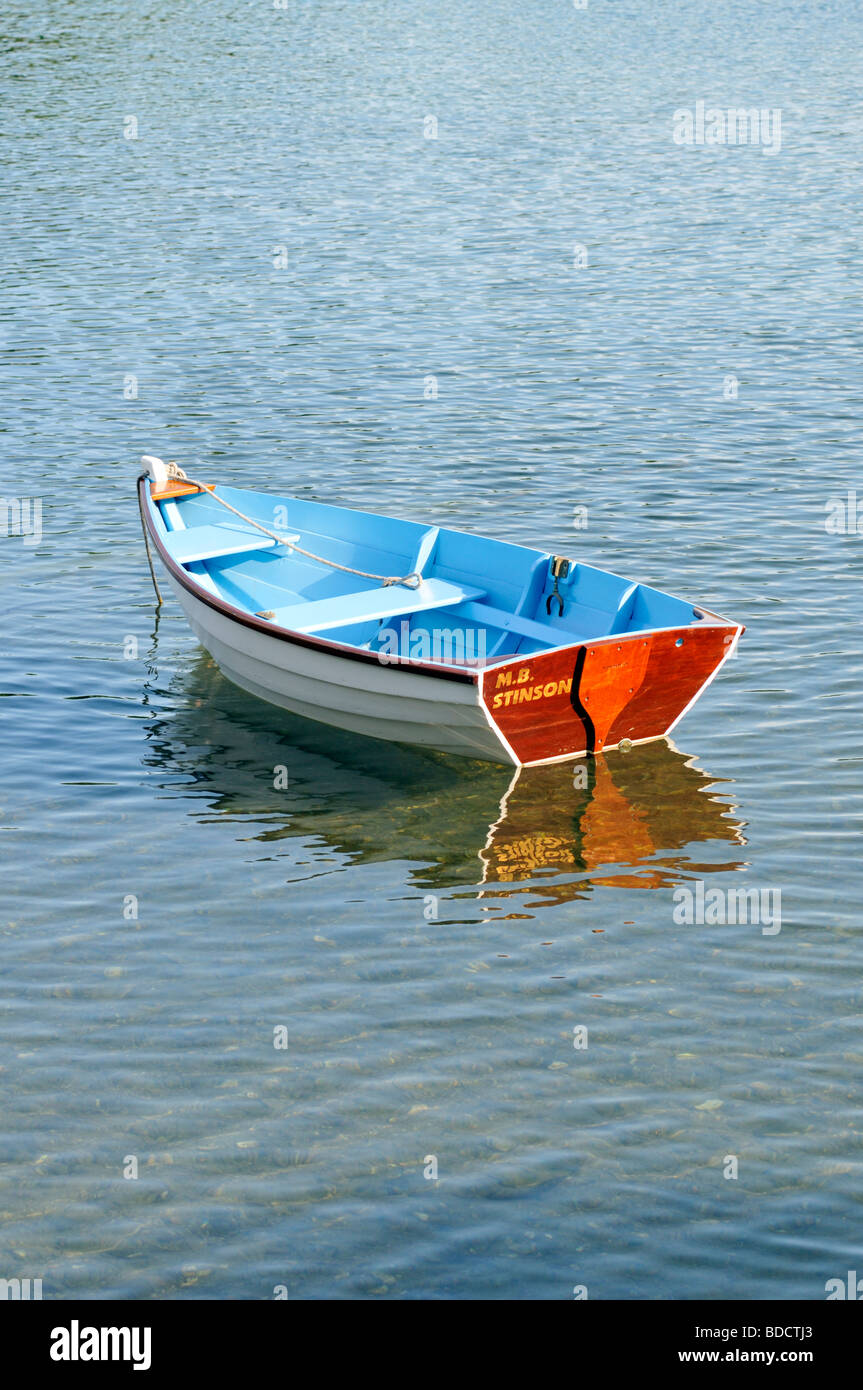 One rowboat alone in water at Quissett harbor Falmouth Cape Cod Stock ...