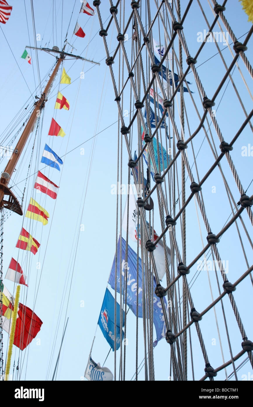 flag mast pulley rope sail ship sky vessel white Stock Photo - Alamy