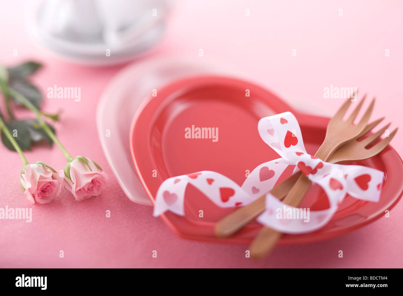Heart shaped plate and fork Stock Photo - Alamy