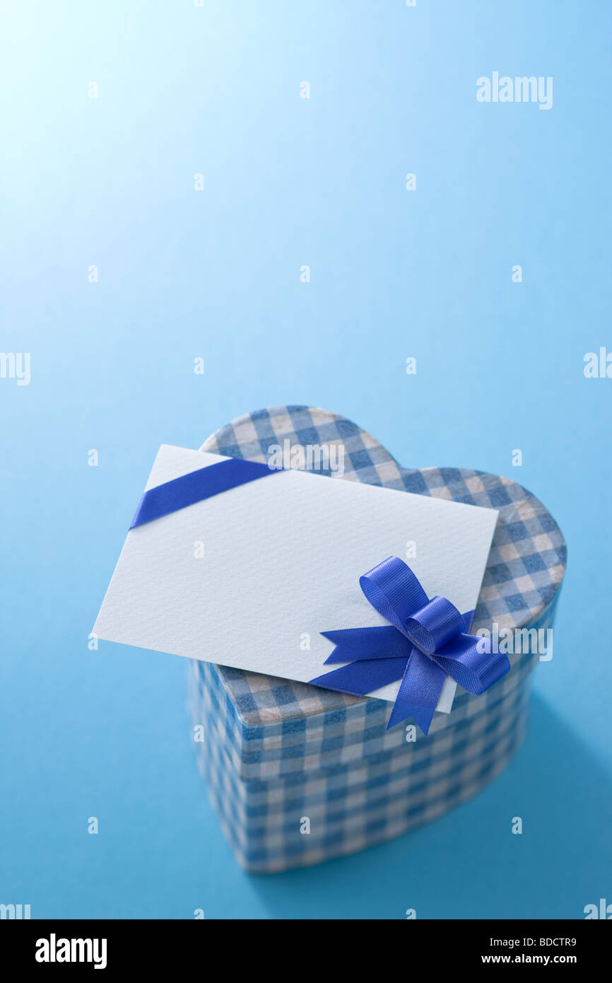 Heart shaped box and message card Stock Photo - Alamy
