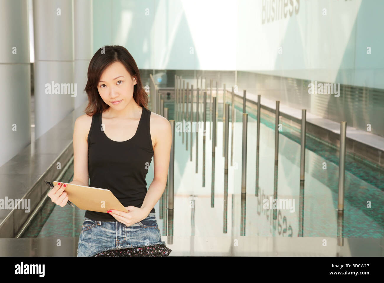 Asian Young Career Woman Outside an Office Stock Photo - Alamy