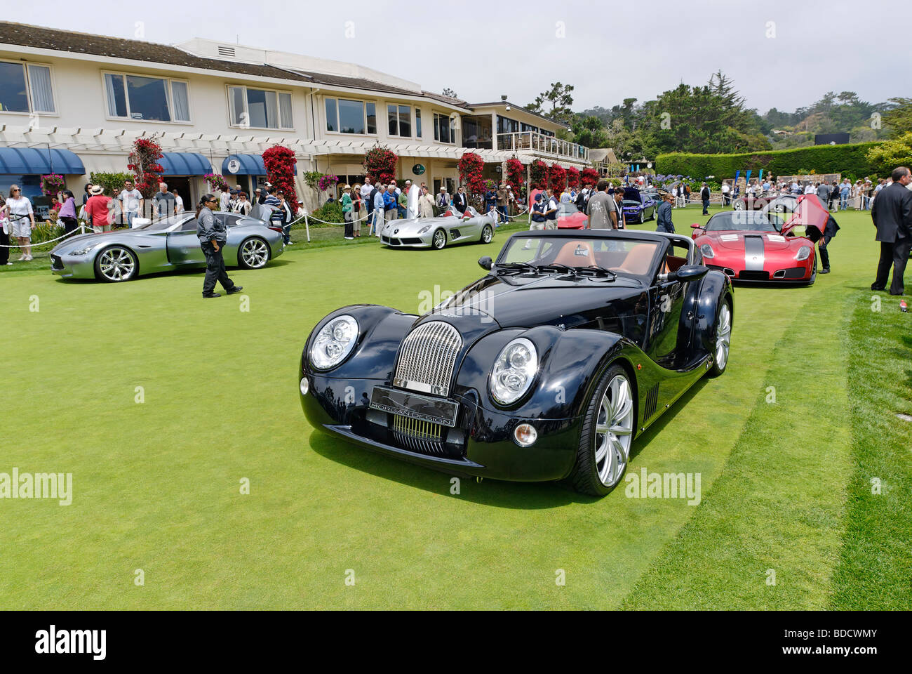 The cars and crowds at the Concours d'Elegance. Featured is the ...