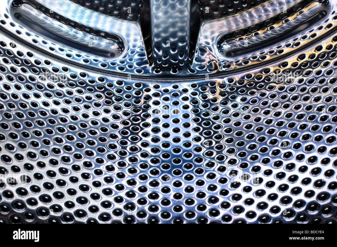 Steel drum inside a washing machine Stock Photo - Alamy