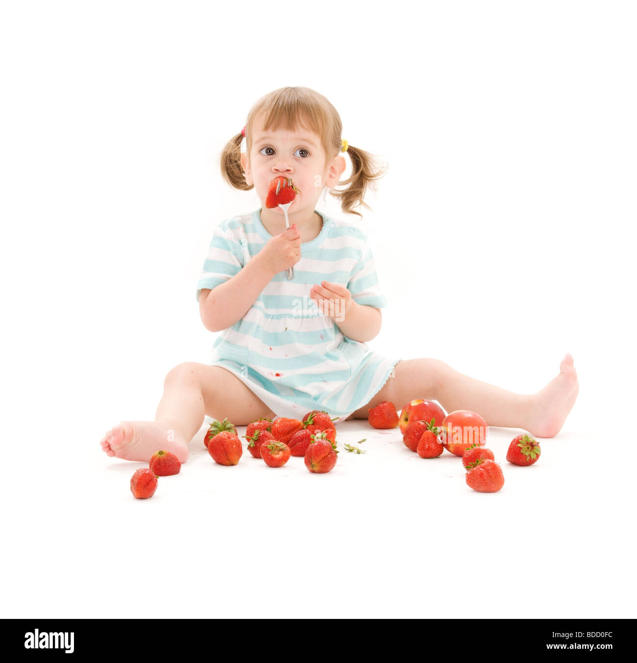 picture of little girl with strawberry over white Stock Photo - Alamy