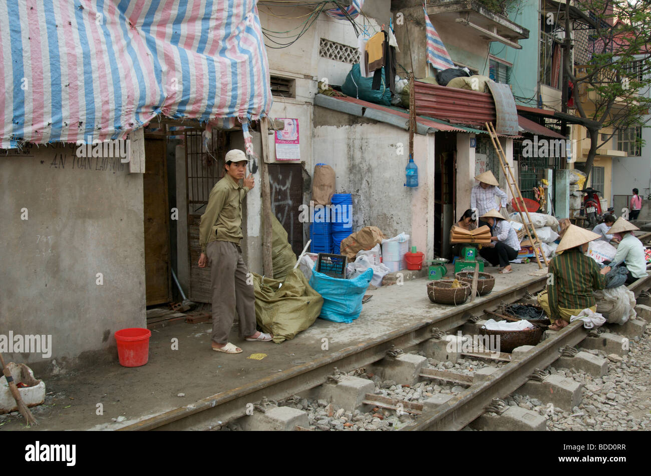 Vietnamese sitting on hanoi rail tracks hi-res stock photography and ...