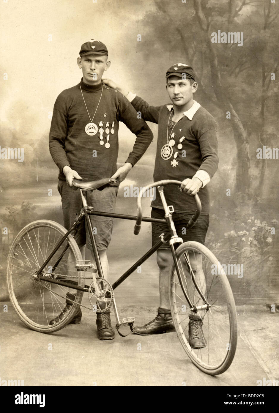 Two Bicycle Racers & Bicycle Stock Photo - Alamy