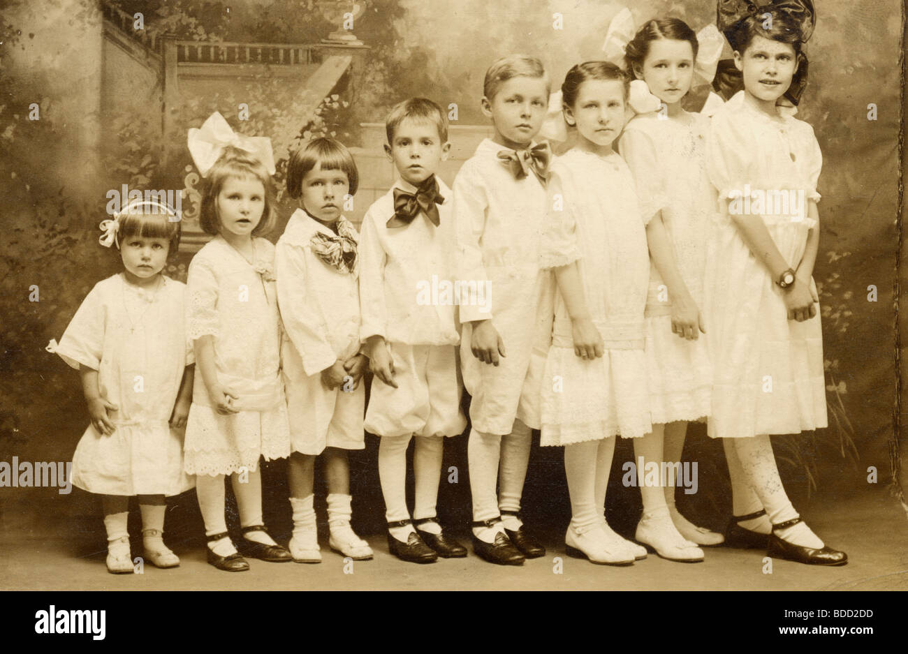 Eight Children All in a Row Stock Photo - Alamy