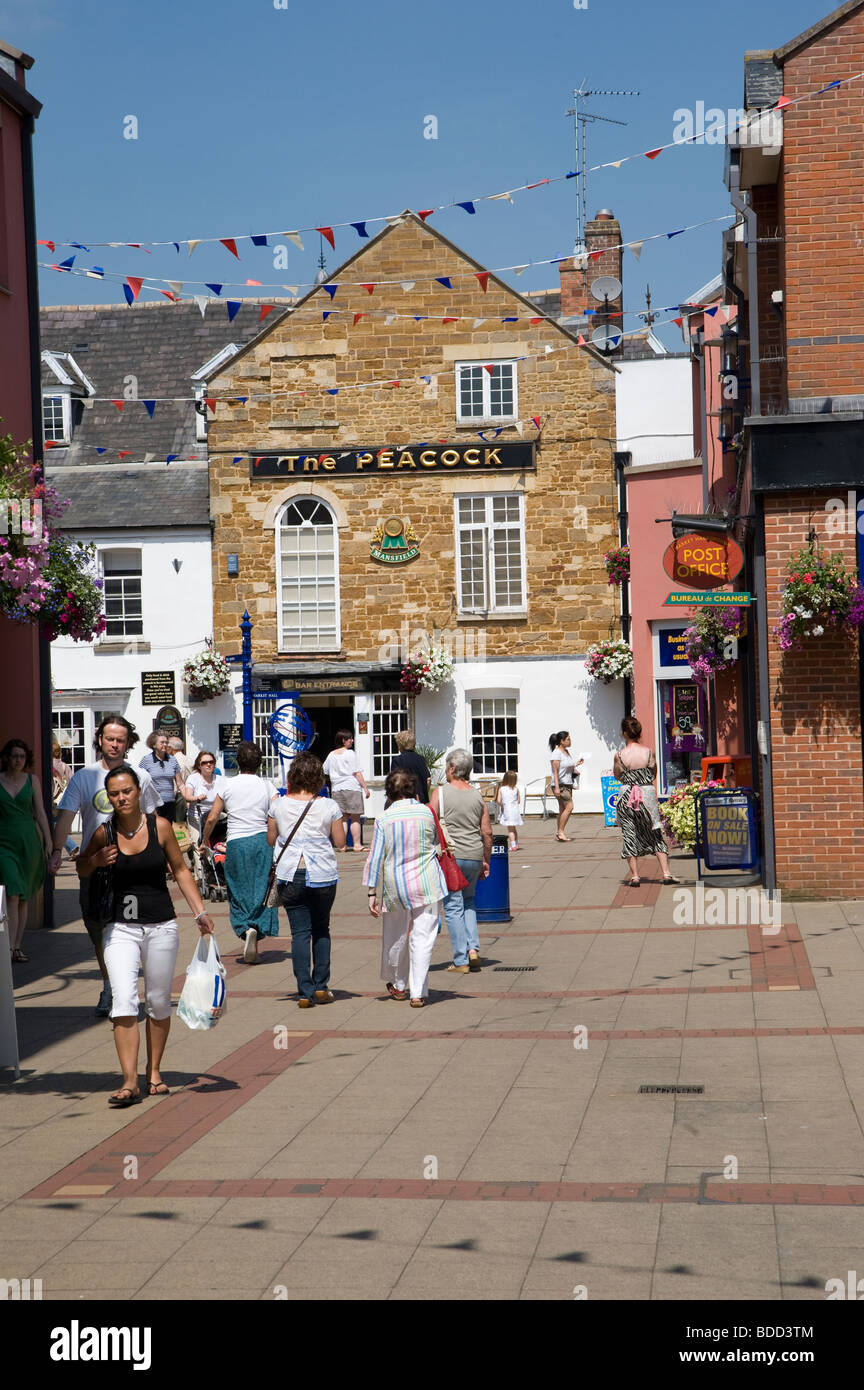 People walking through a pedestrianised zone in the pretty market town ...