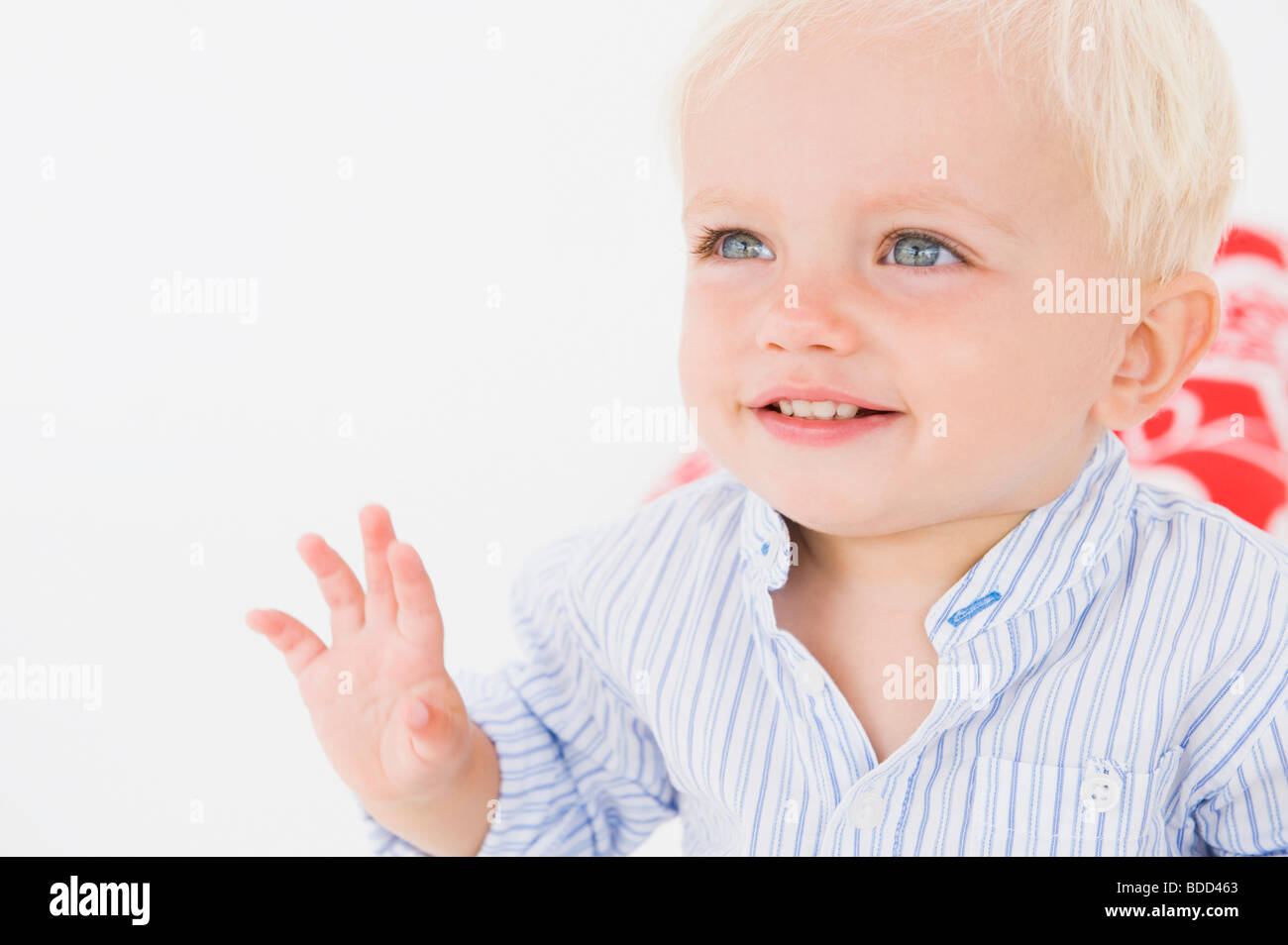 Close up blond boy gesturing hi-res stock photography and images - Alamy