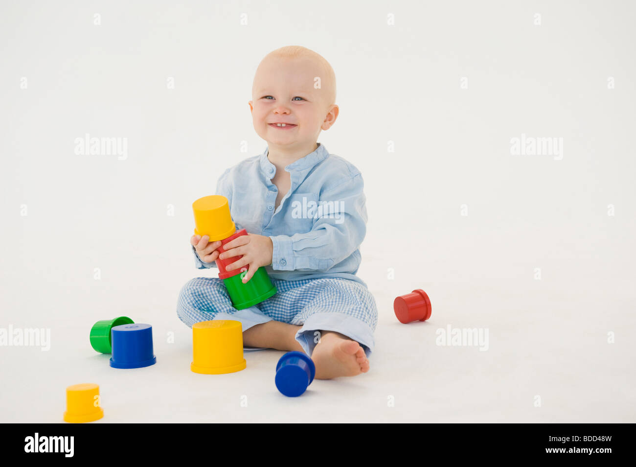 Baby boy stacking blocks Stock Photo - Alamy