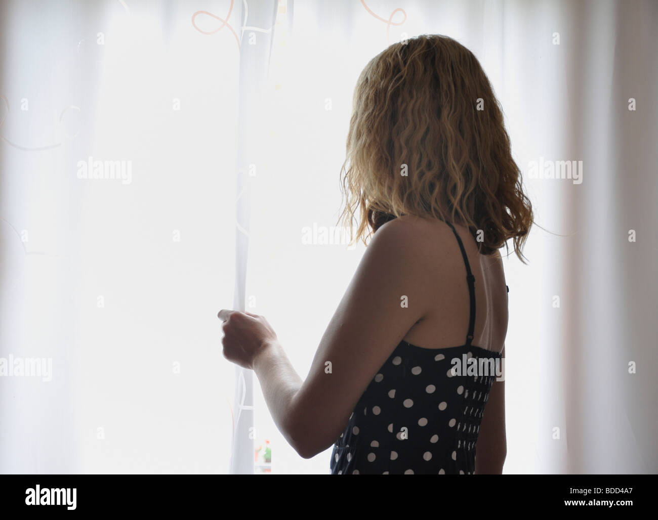 Female peek peeking hi-res stock photography and images - Alamy