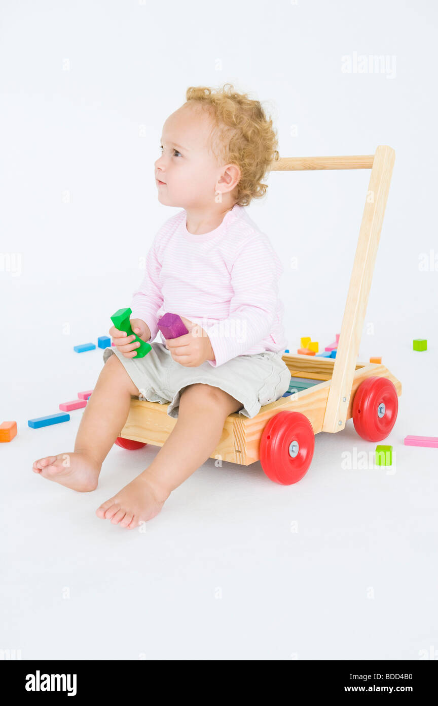 Cute baby boy push cart hi-res stock photography and images - Alamy