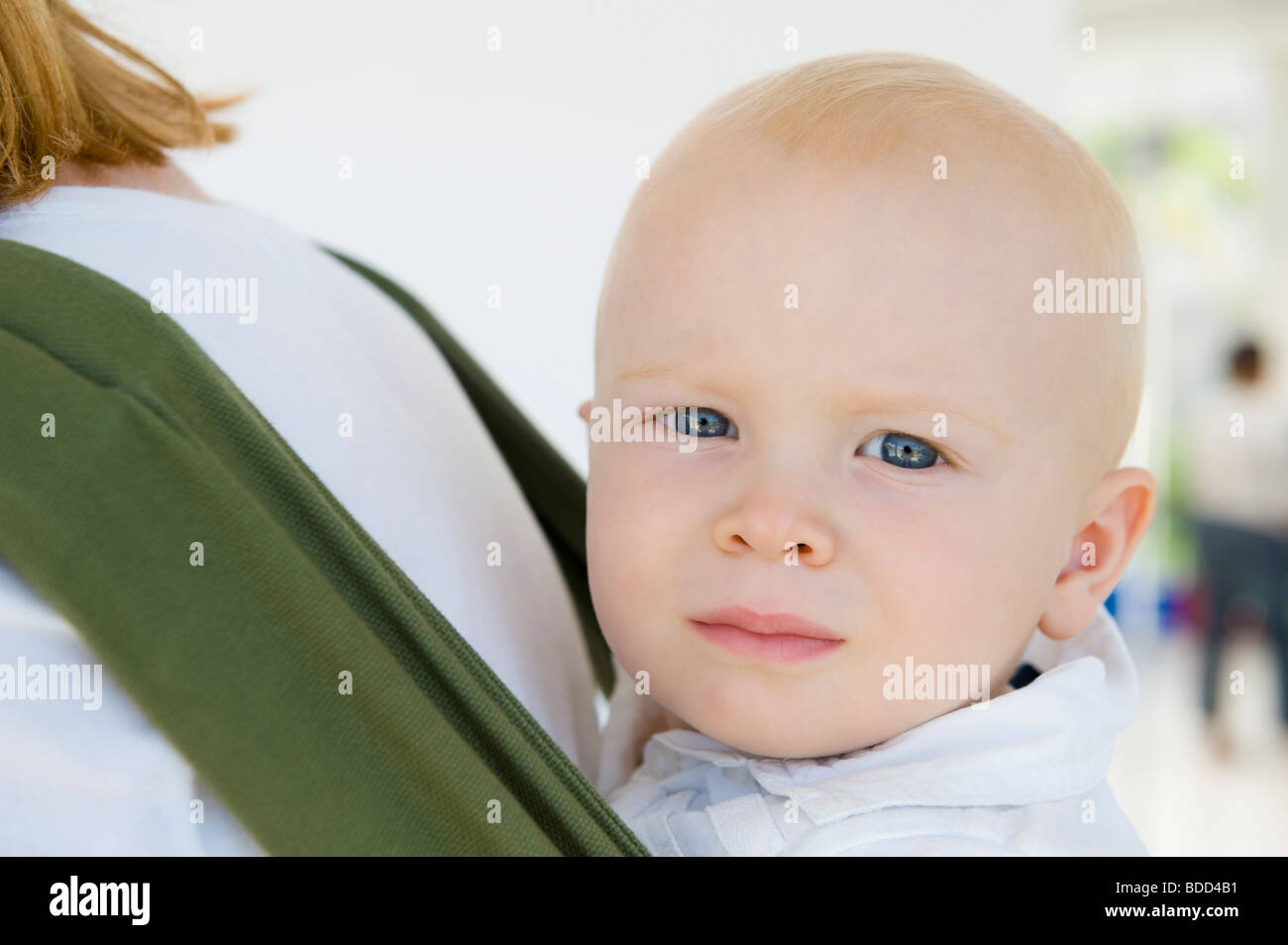 Baby in a carrier hi-res stock photography and images - Alamy