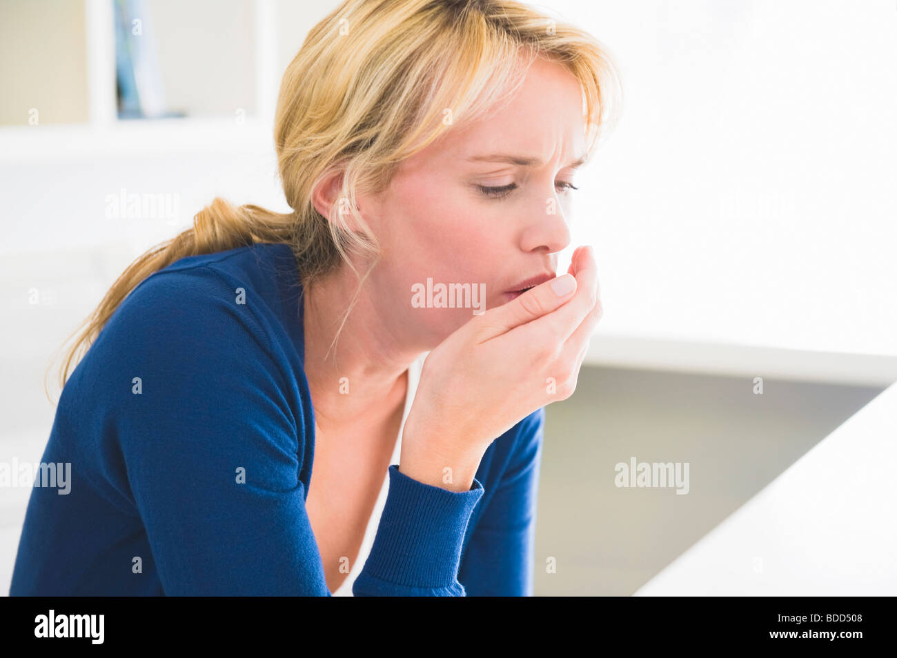 Close-up of a woman coughing Stock Photo - Alamy