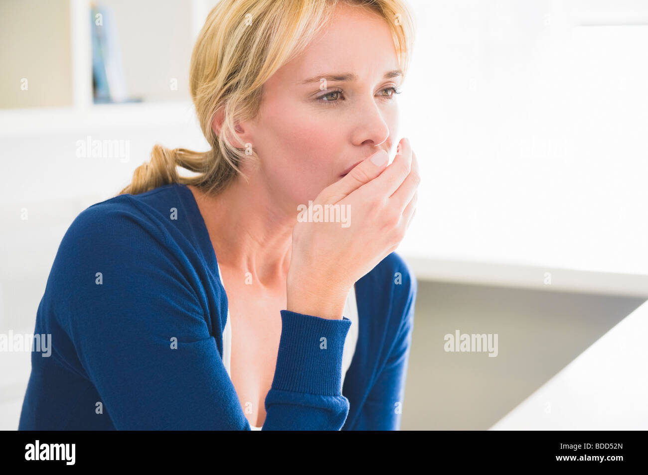 Close-up of a woman coughing Stock Photo - Alamy