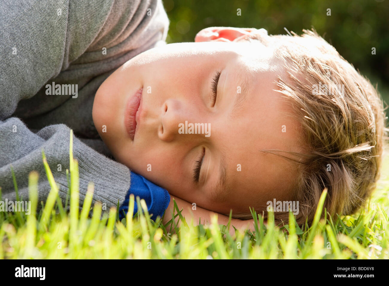 Boy Napping On Grass High Resolution Stock Photography and Images - Alamy