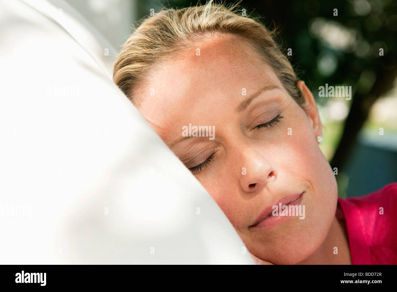 Close-up of a woman napping Stock Photo - Alamy