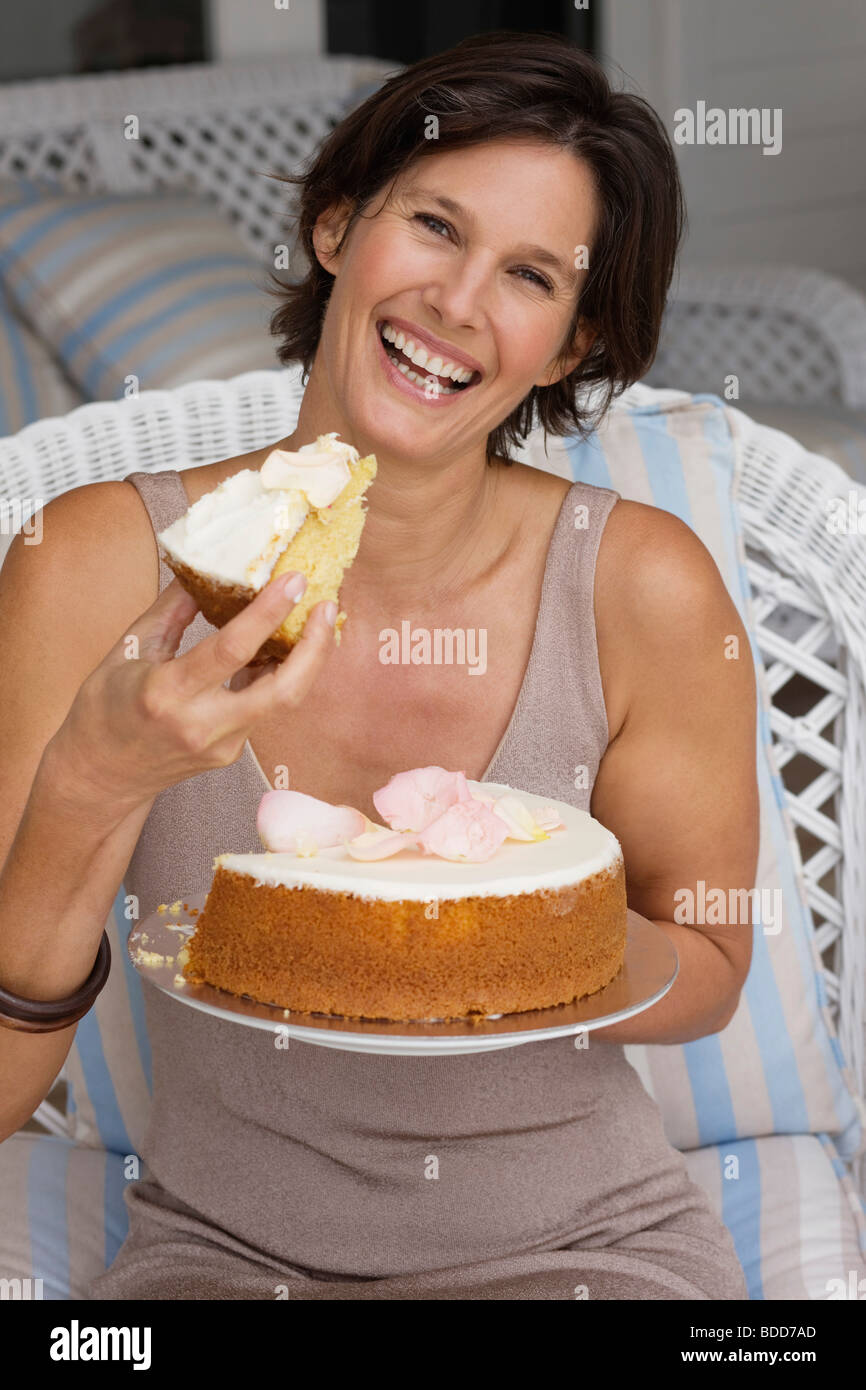 Woman holding a cake Stock Photo - Alamy
