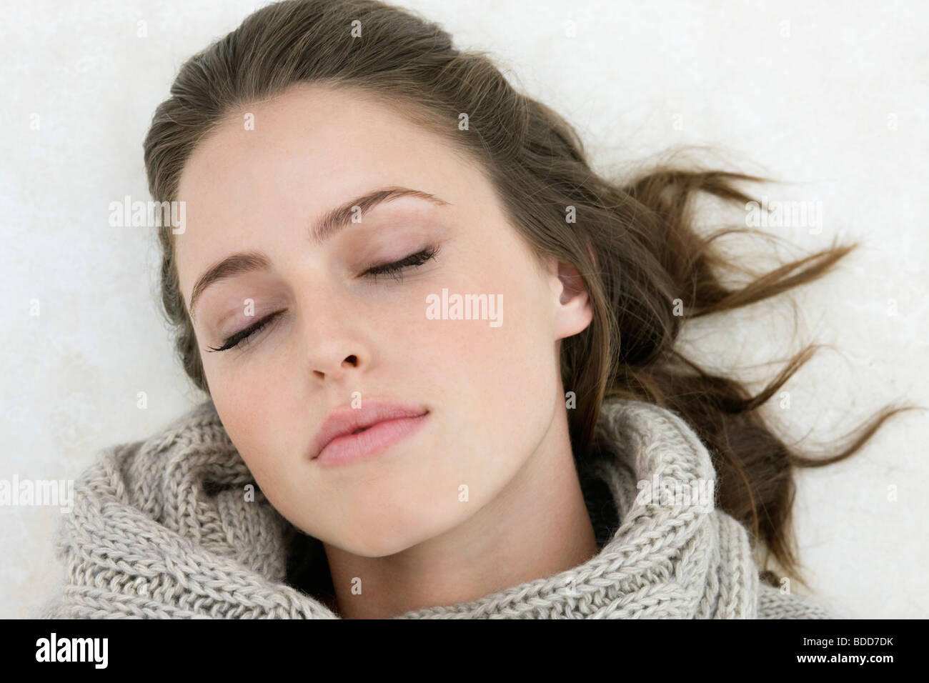 Woman resting on the floor Stock Photo - Alamy