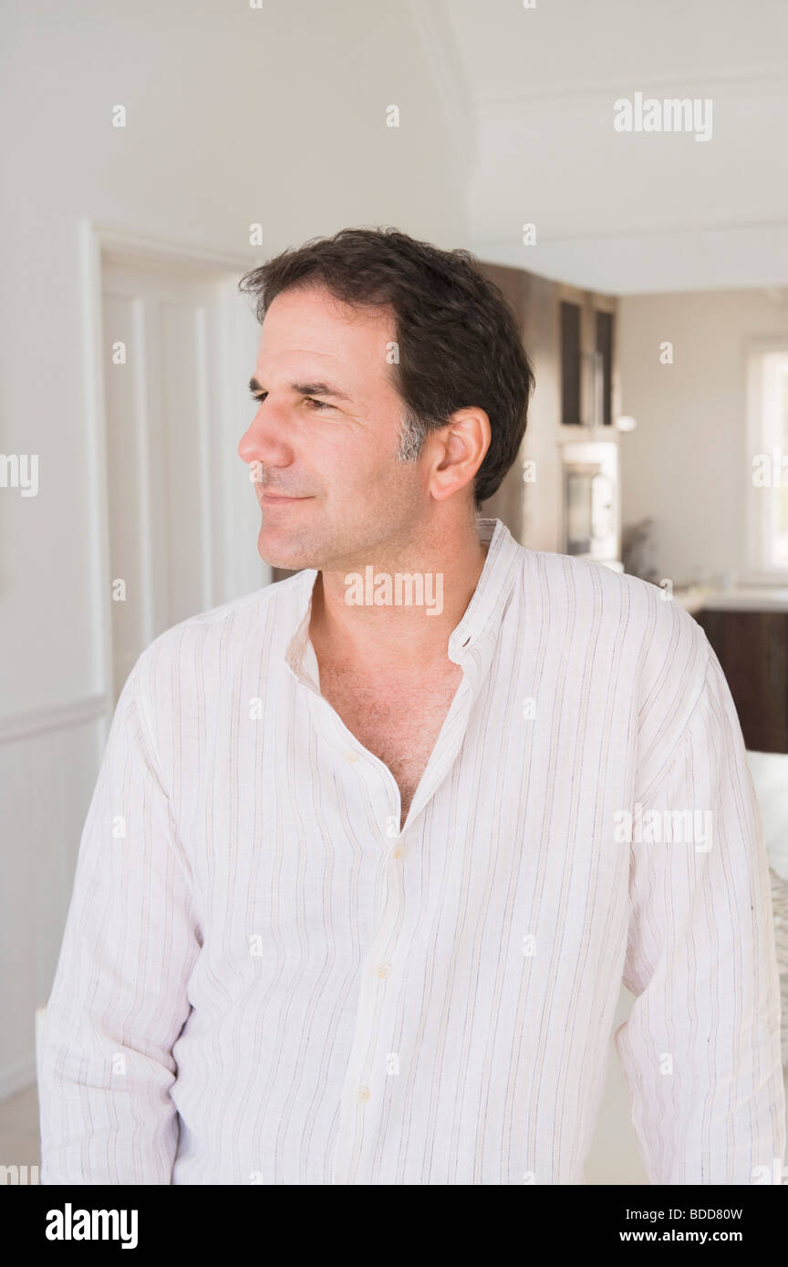 Man standing in the kitchen Stock Photo - Alamy
