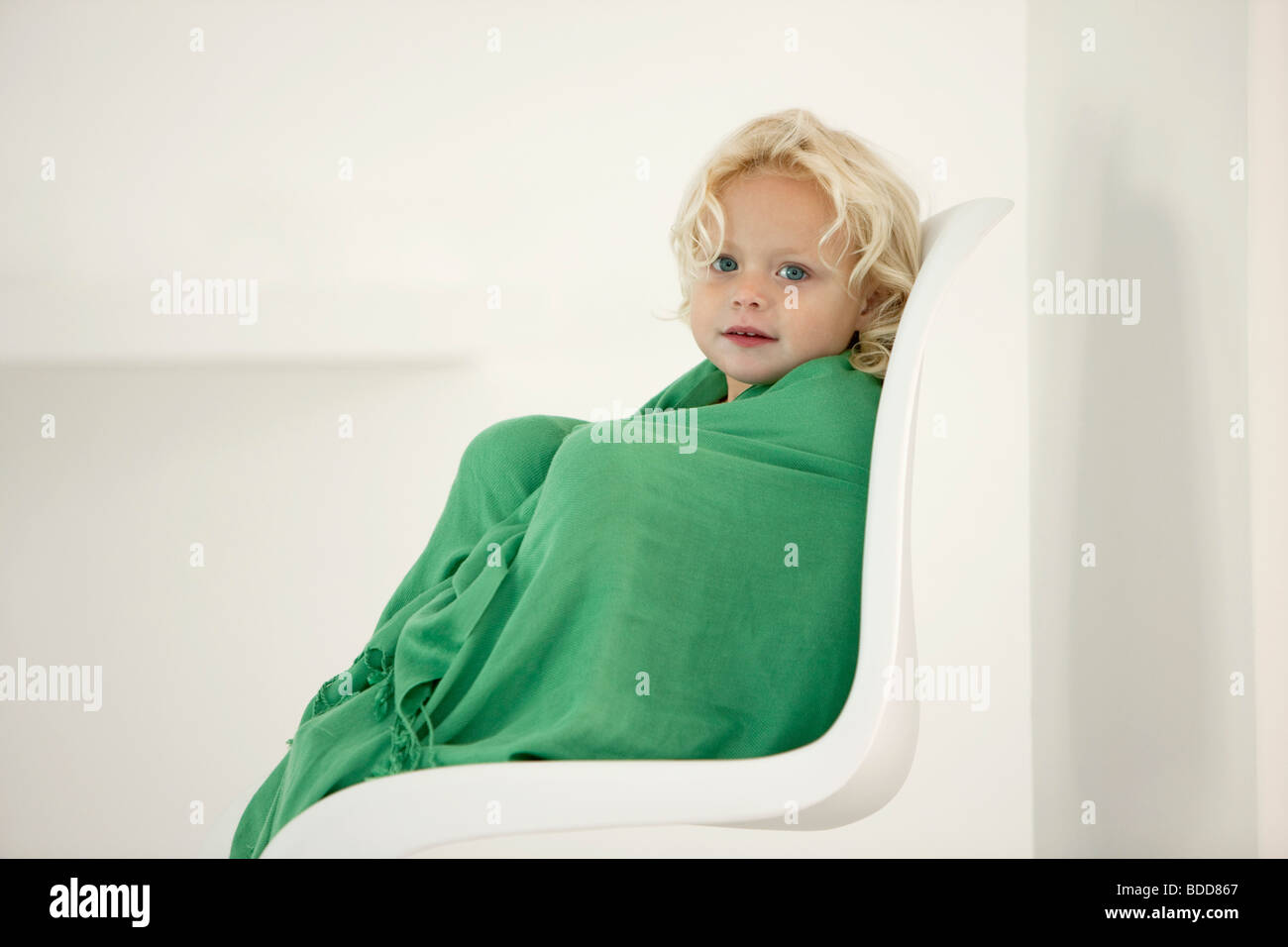 Girl wrapped in a shawl Stock Photo - Alamy