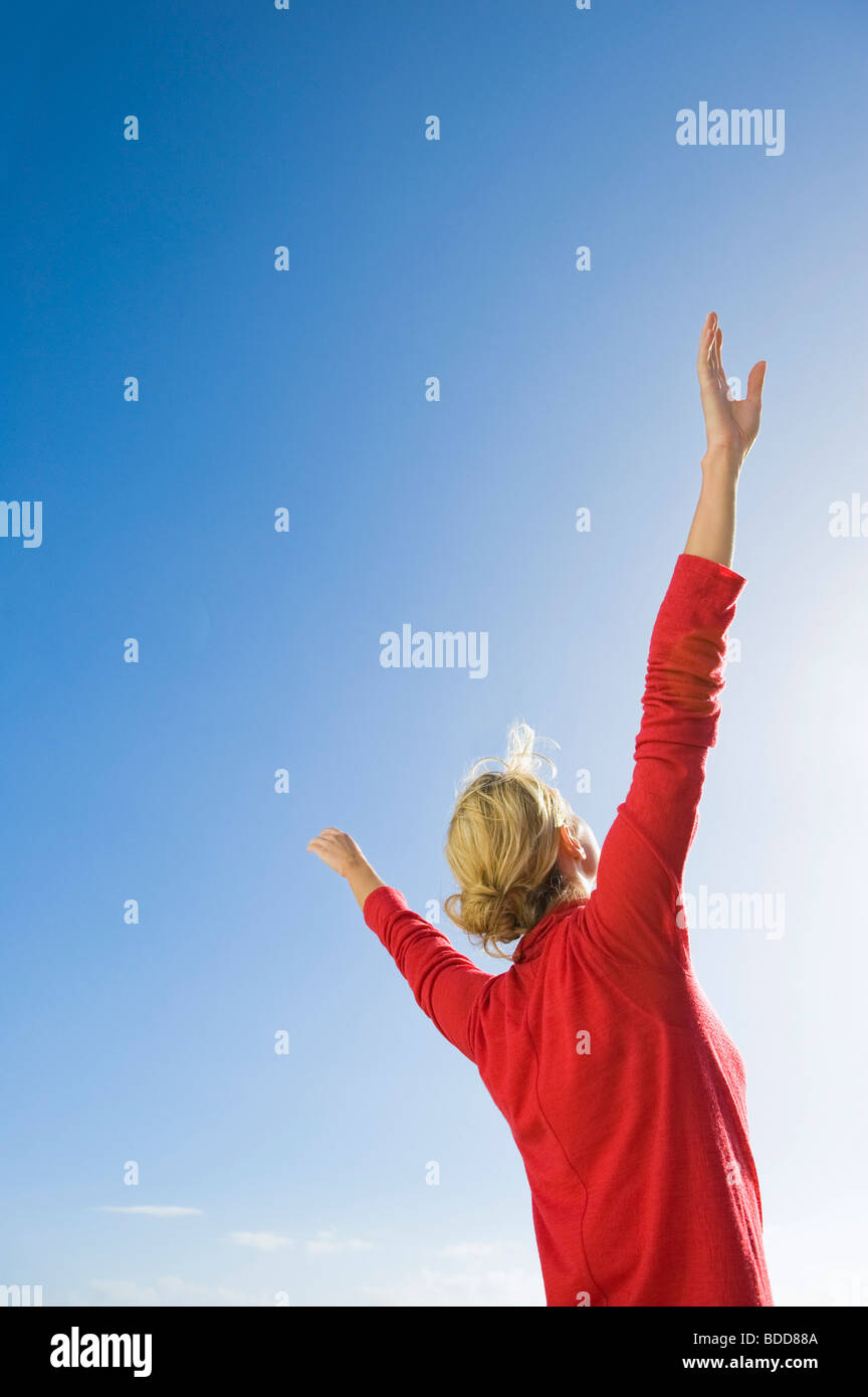 Woman stretching her arms Stock Photo - Alamy