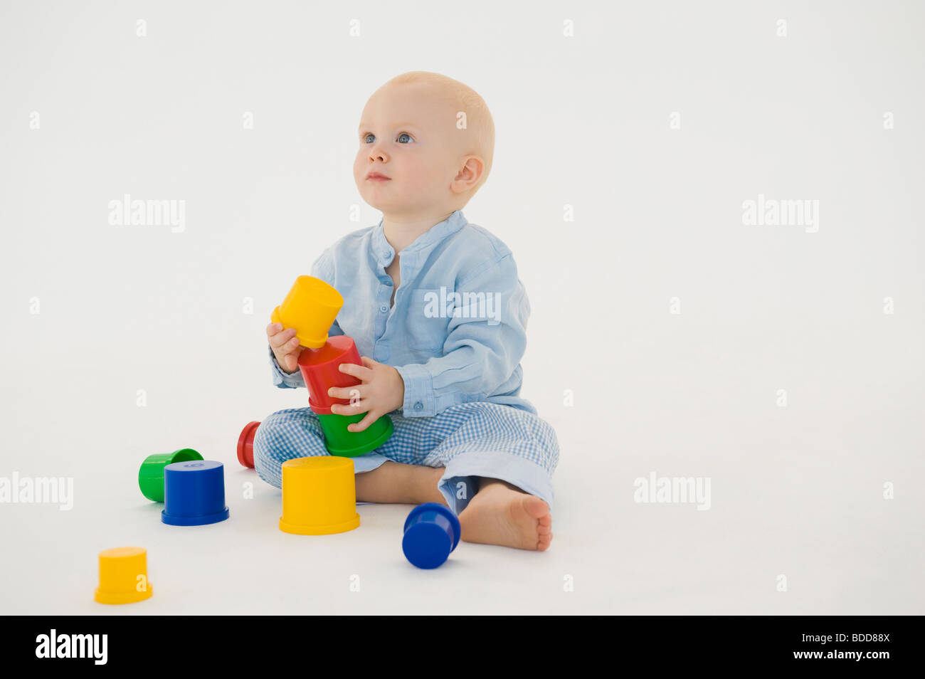 Baby boy stacking blocks Stock Photo - Alamy