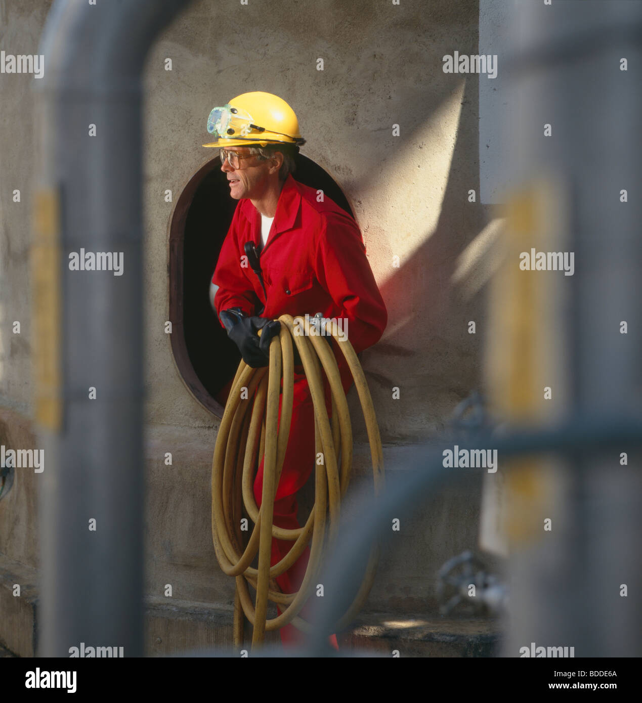 Carrying hose hi-res stock photography and images - Alamy